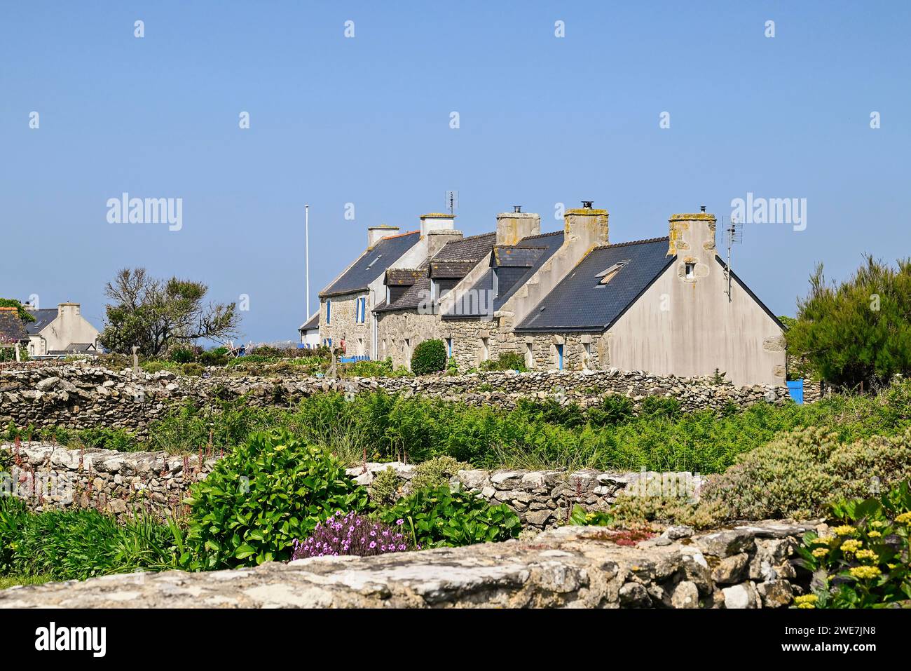 Building and walls of a hamlet, Ouessant Island, Finistere, Brittany ...