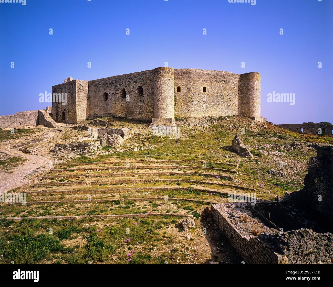 Old fortress with an ancient amphitheatre surrounded by purple ...