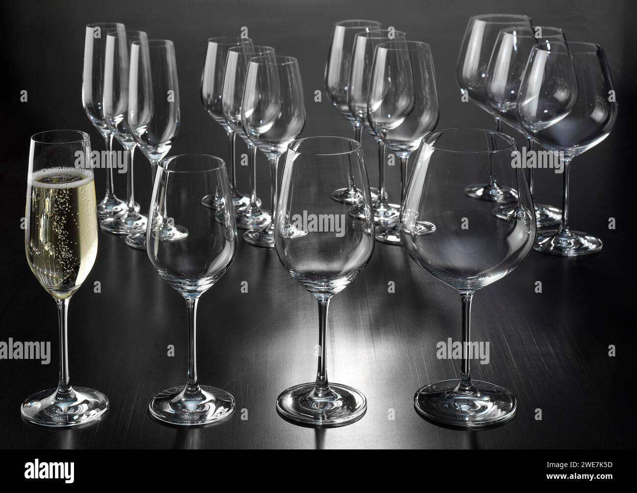 Wine glasses, champagne goblets, a filled champagne goblet Stock Photo ...