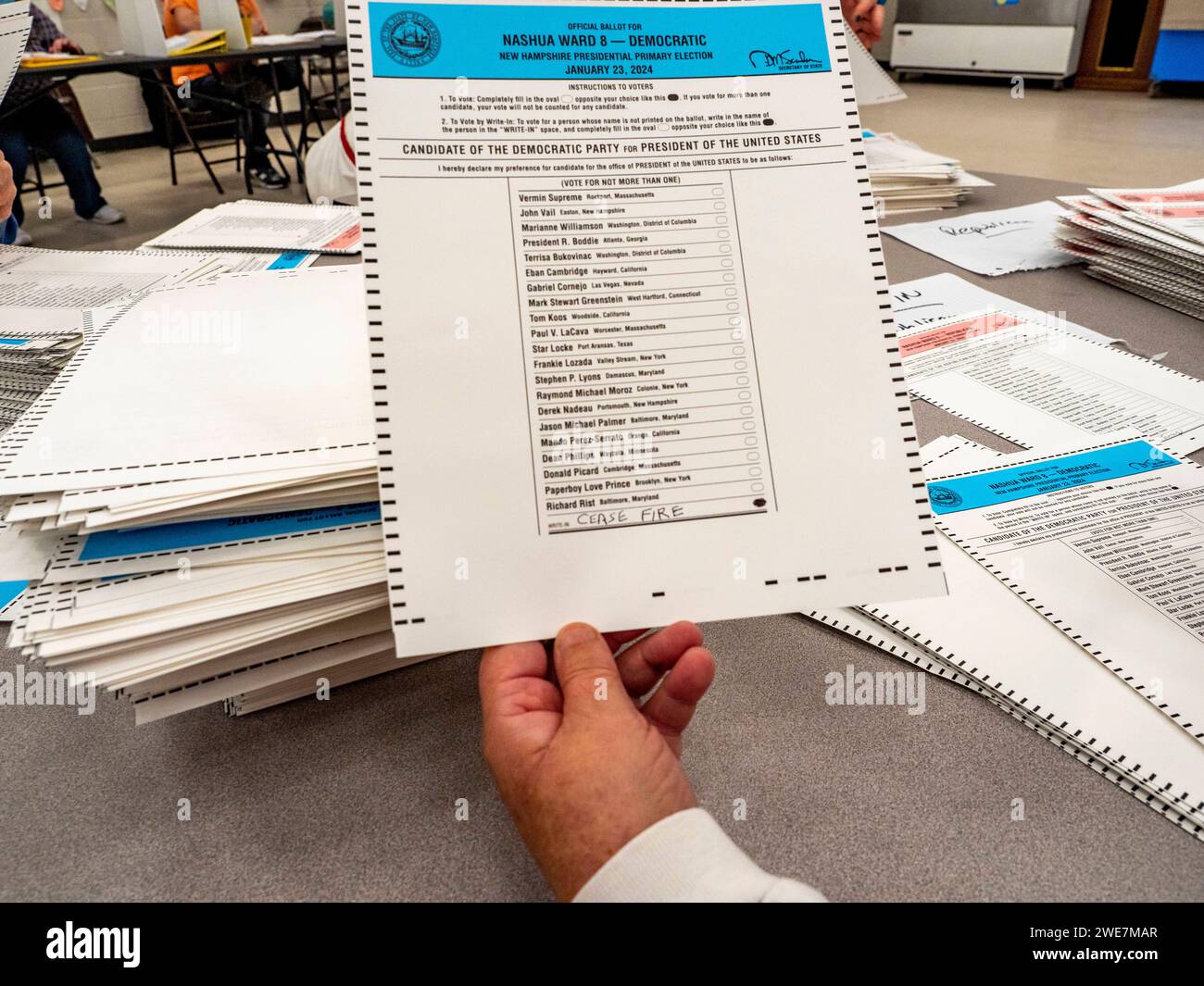 Nashua, New Hampshire, USA. 23rd Jan, 2024. Election workers sort the ...
