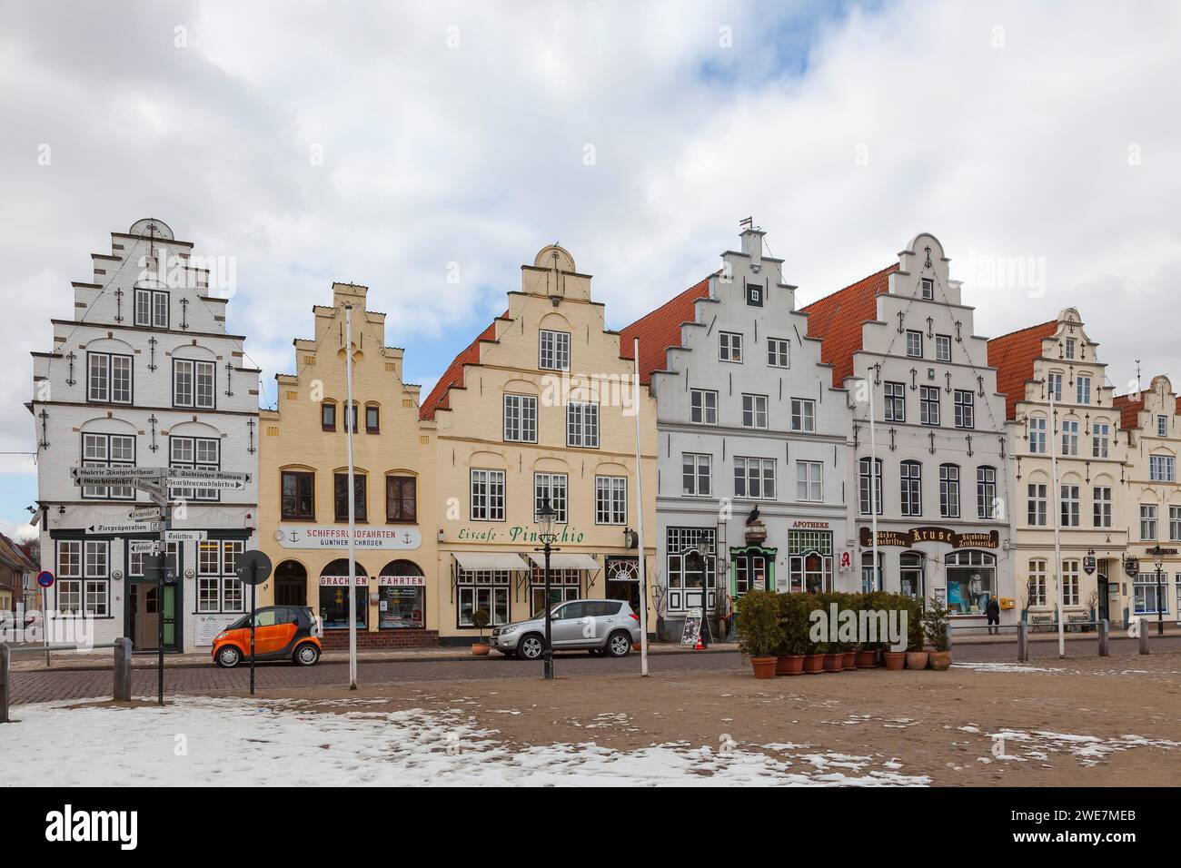 Historic houses on the market square of Friedrichstadt, stepped gabled ...