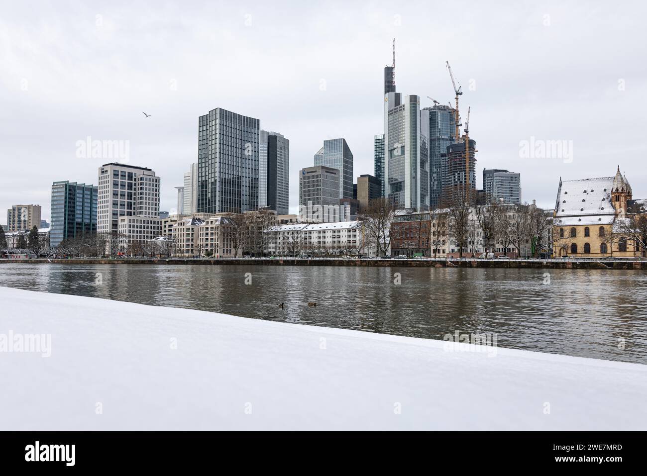 The Frankfurt banking skyline is snow-covered in winter, Frankfurt am ...