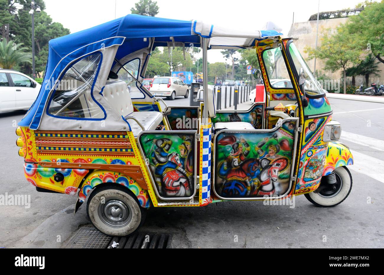 A colorful Italian Piaggio Three-Wheeler in Palermo, Italy Stock Photo ...