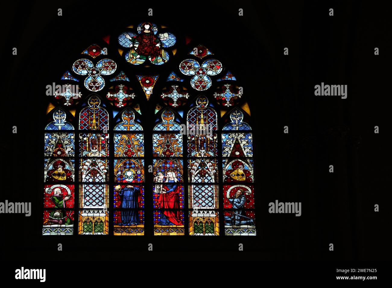 Church window with Mary, Jesus and knight figures, interior view, arts ...