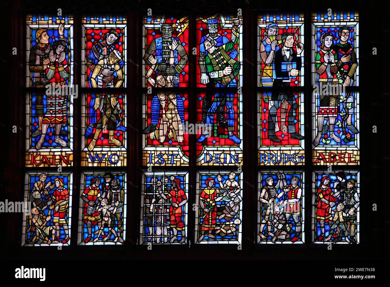 Colourful stained glass window with inscription Cain where is your ...