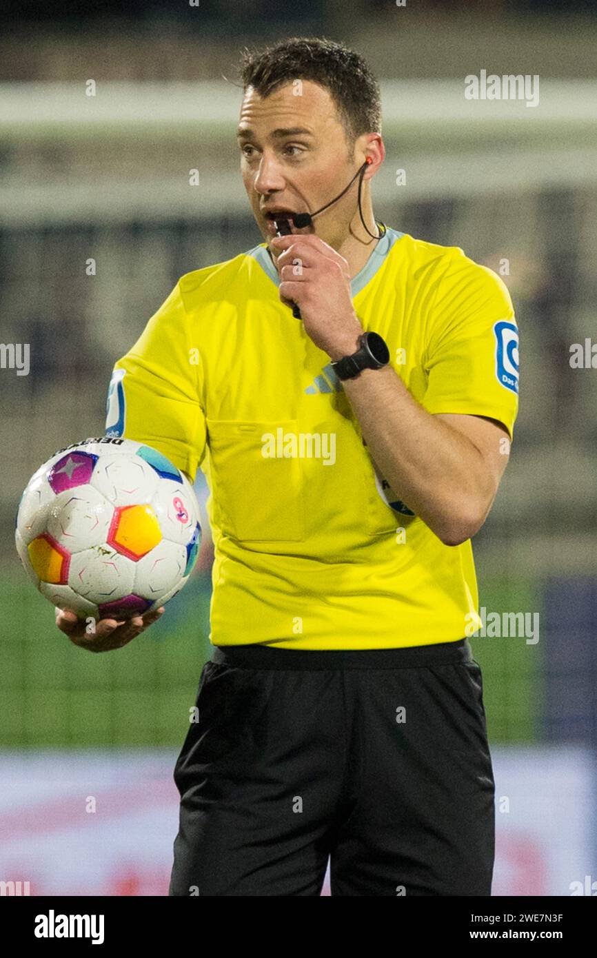 Football match, referee Felix ZWAYER with ball in hand and whistle ...