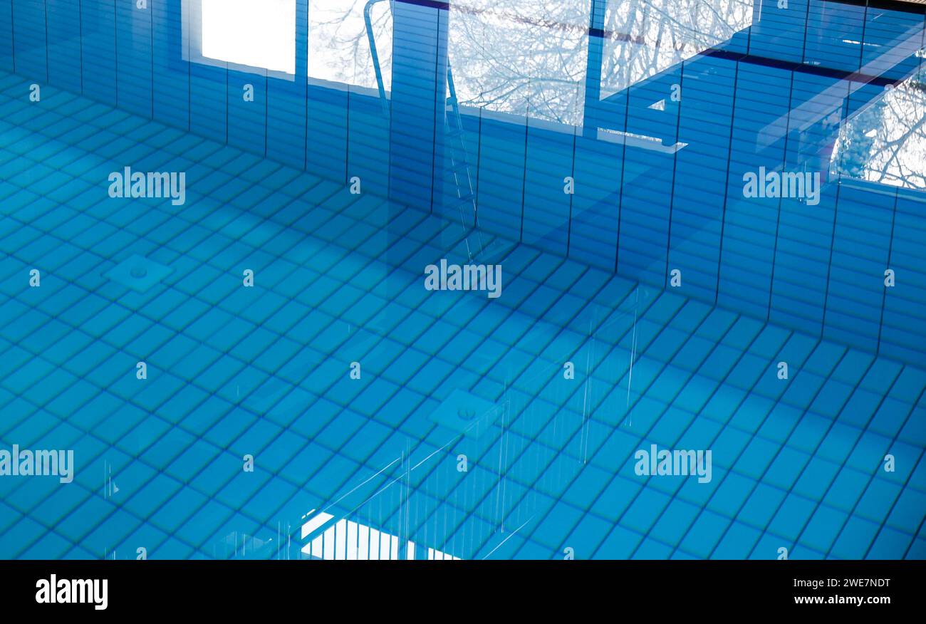 The diving tower is reflected in the swimming pool of the reopened ...