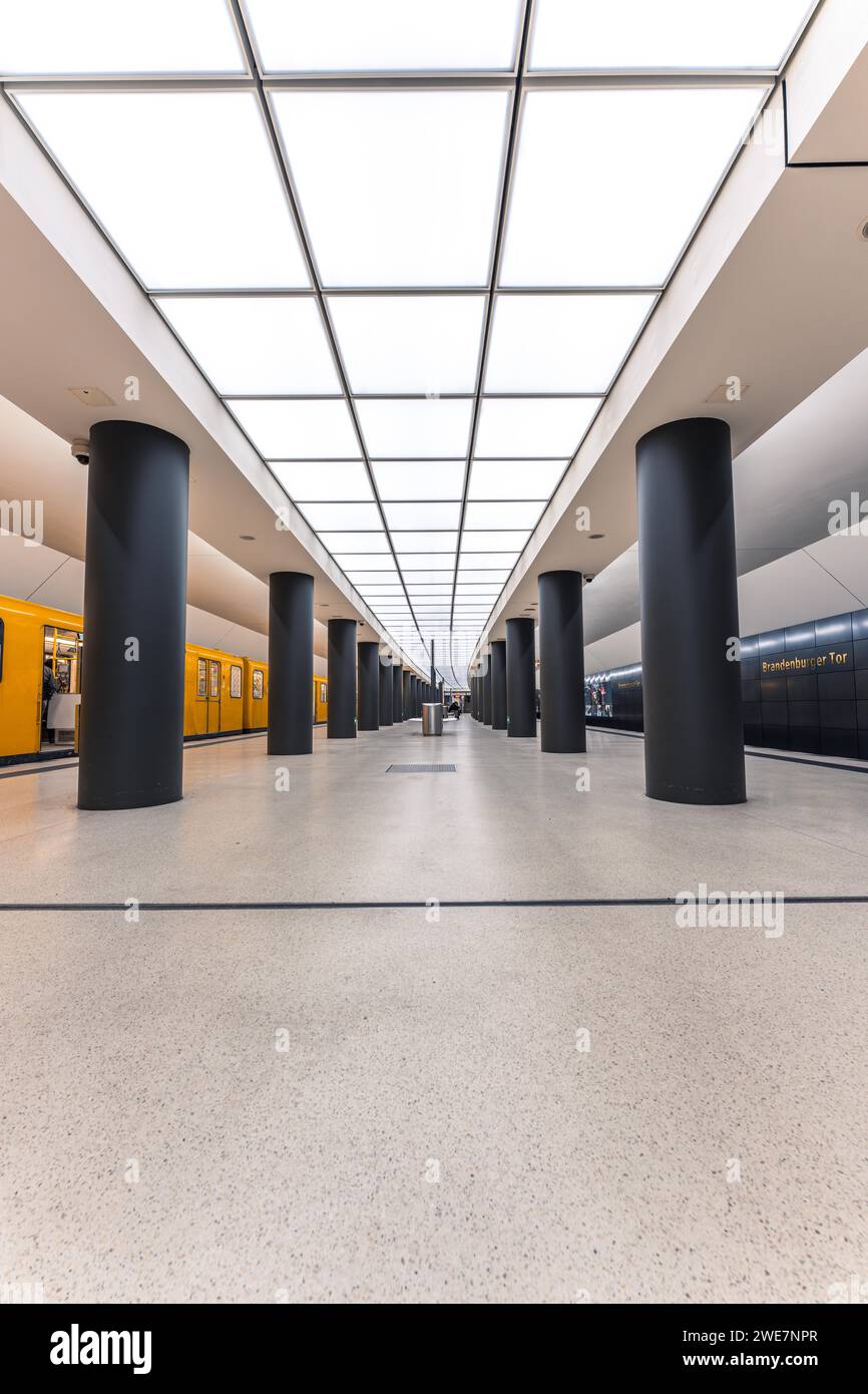 Long, symmetrical view of a modern building interior with rectangular ...