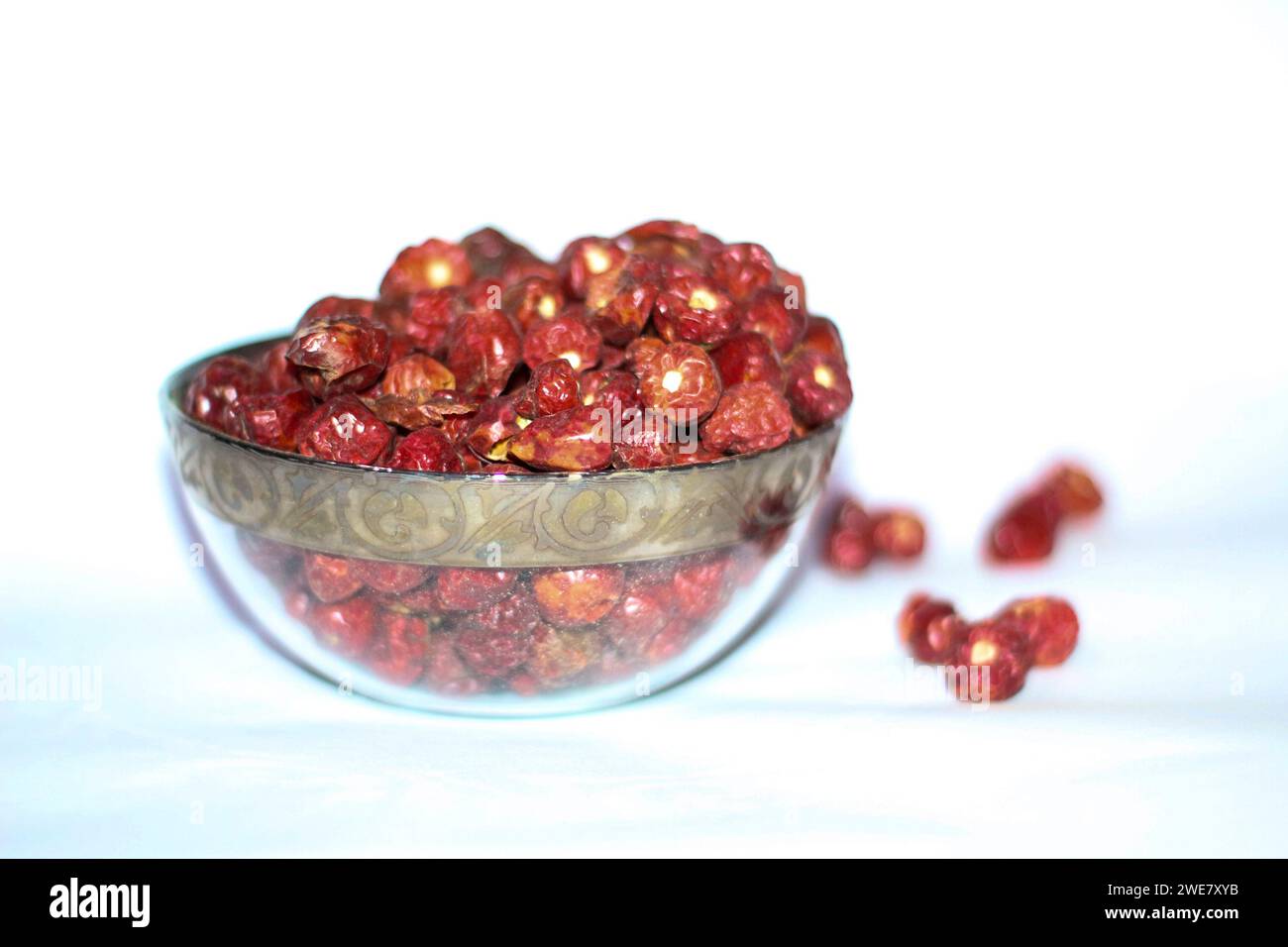 Bowl of red chilli on white background Stock Photo - Alamy