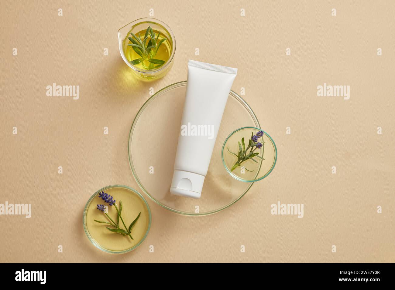 White cosmetic container without label put on round podium and ...