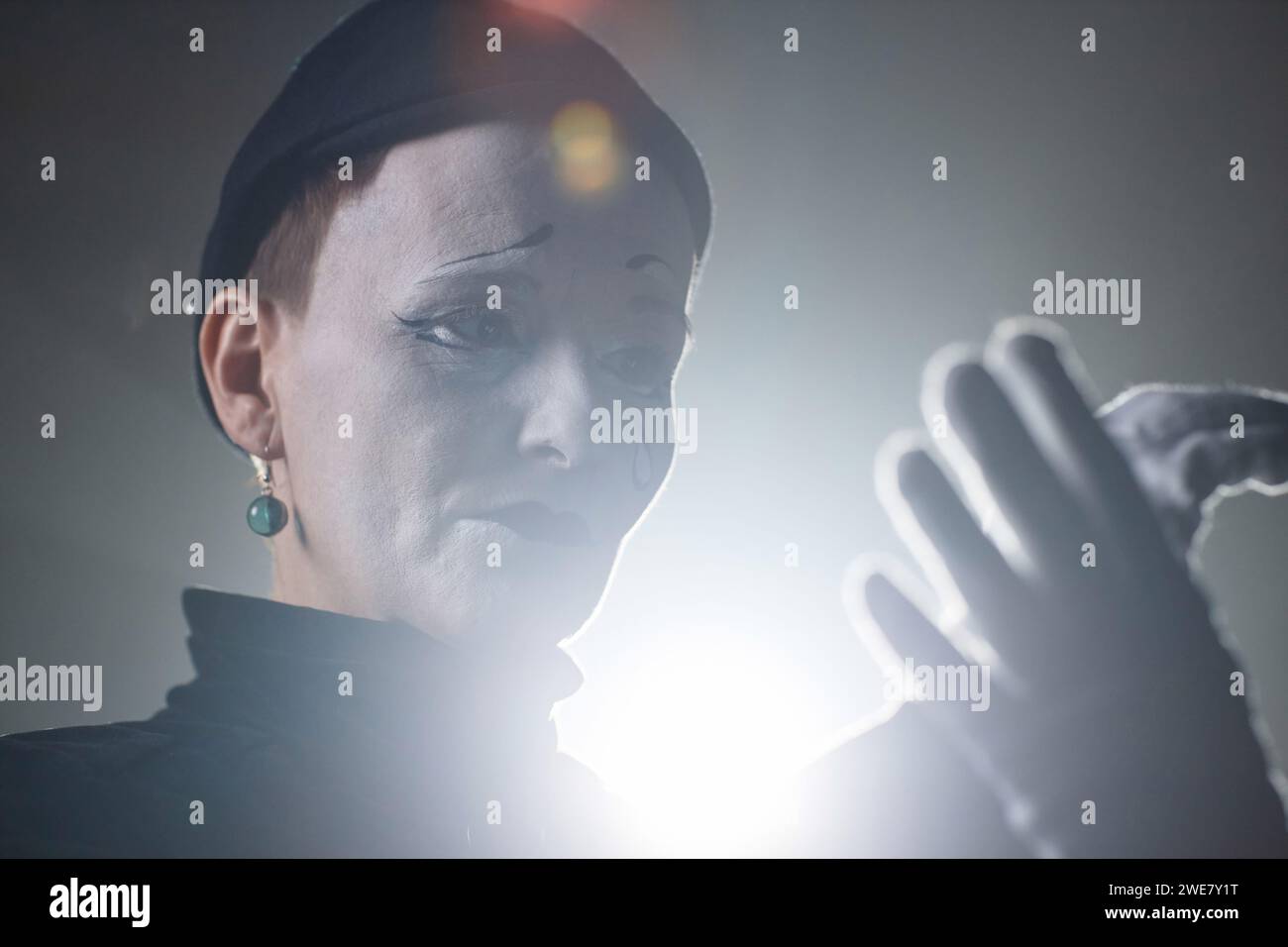 Dramatic closeup portrait of sad mime artist with tear makeup ...