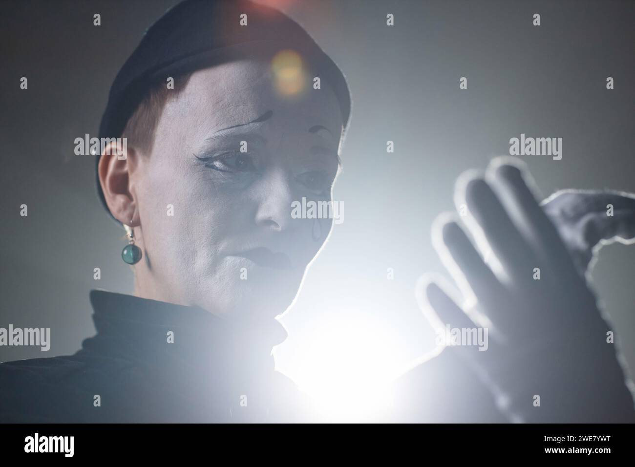 Dramatic closeup portrait of sad mime artist with tear makeup ...