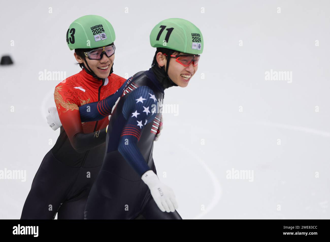 Gangneung, South Korea. 24th Jan, 2024. Zhang Bohao (L) of team China ...