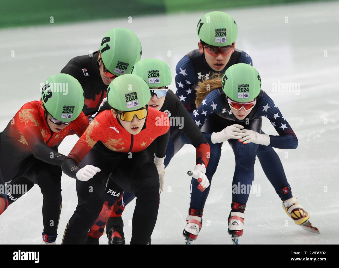 Gangneung, South Korea. 24th Jan, 2024. Zhang Bohao (1st L, front) and ...