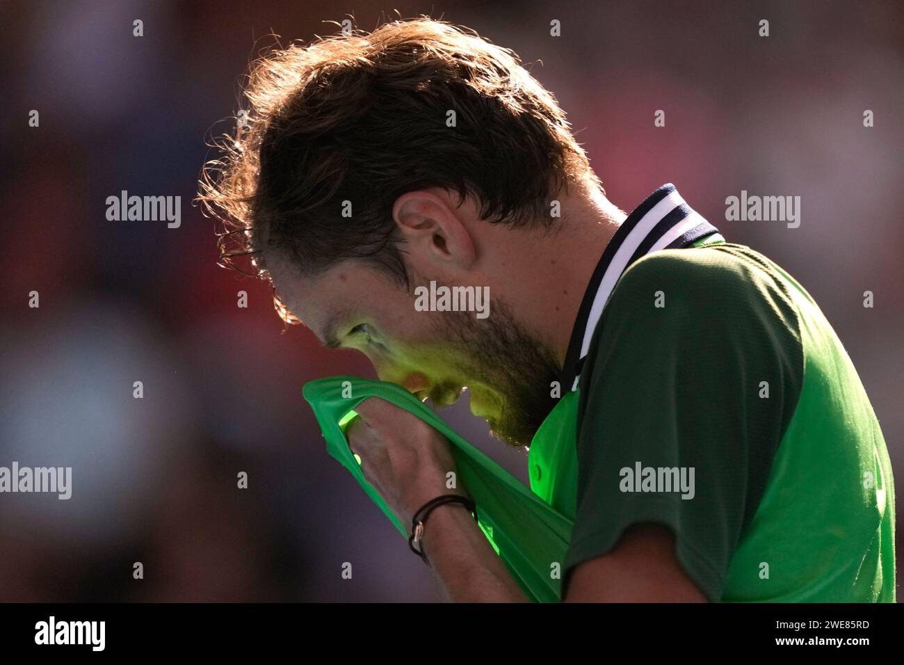 Daniil Medvedev of Russia wipes the sweat from his face during his ...