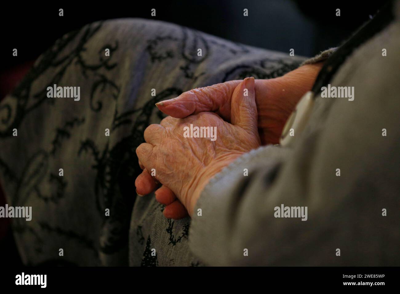 File photo dated 23/02/14 of an elderly person at a charity tea party ...