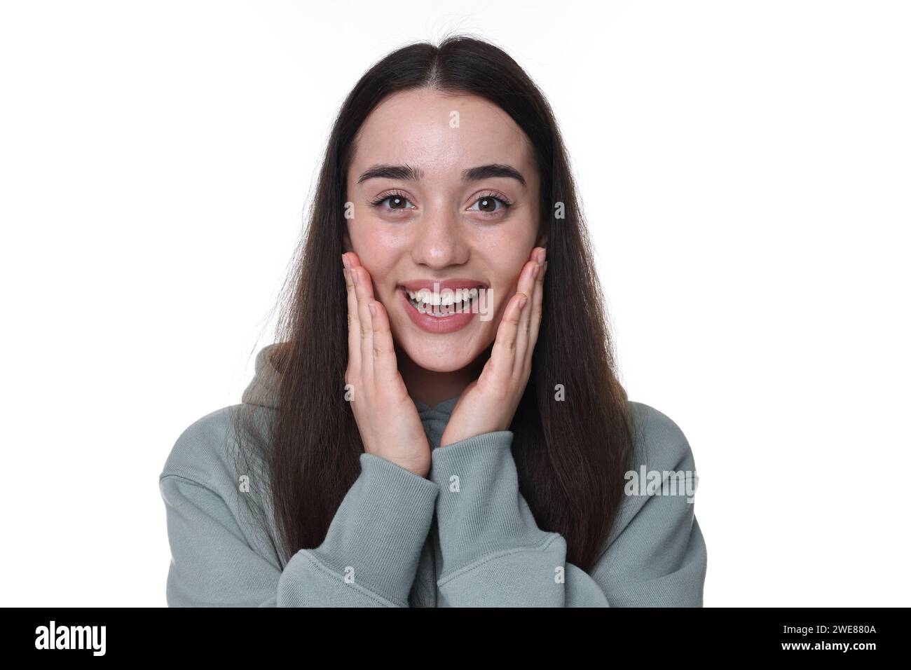 Portrait of happy surprised woman on white background Stock Photo - Alamy