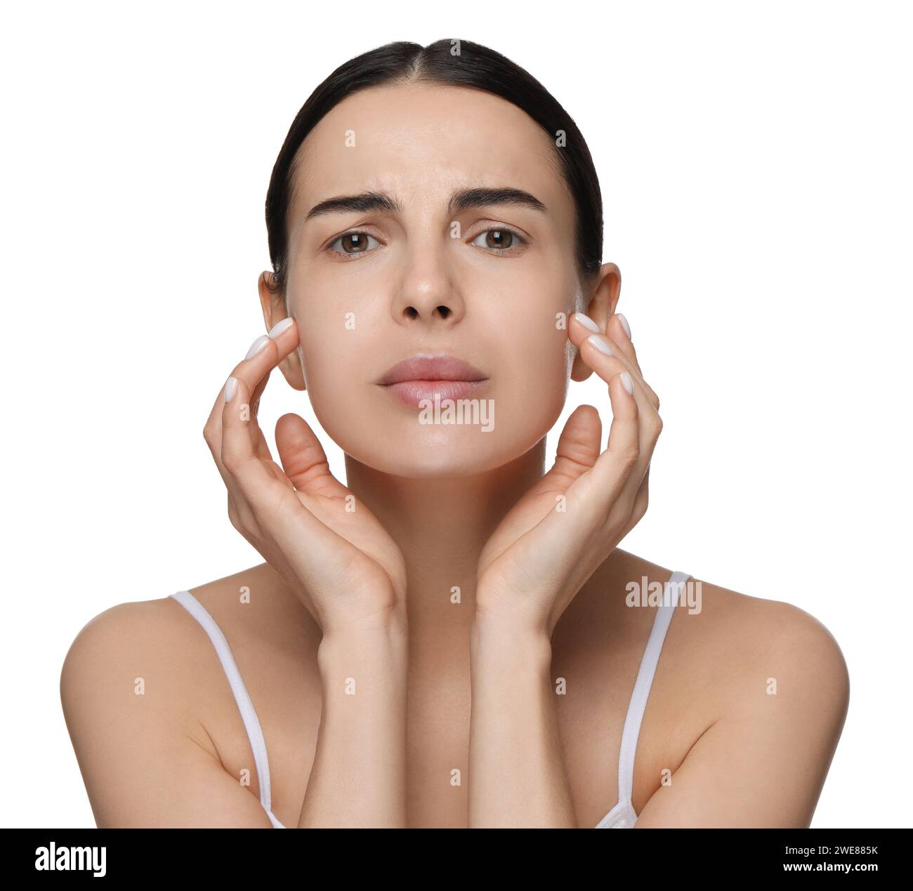 Young woman with dry skin on white background Stock Photo - Alamy