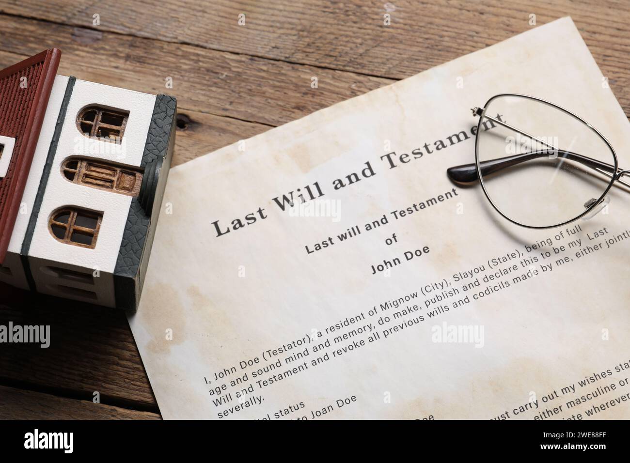 Last Will and Testament, house model and glasses on wooden table ...