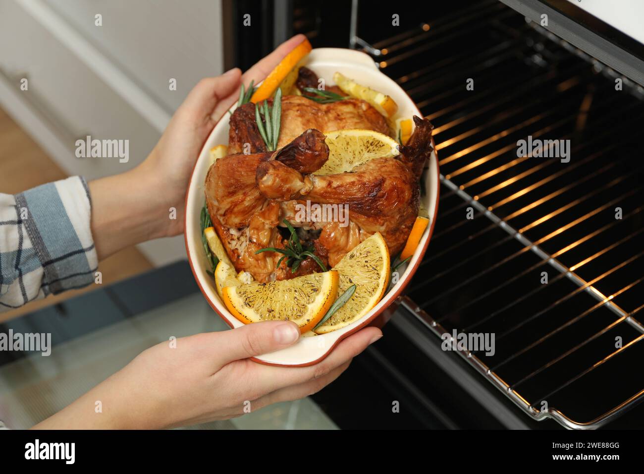Person taking orange out hi-res stock photography and images - Alamy