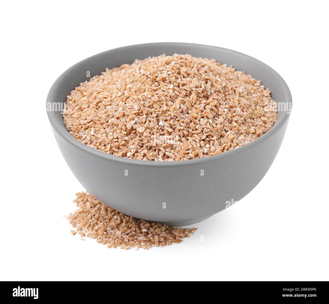 Dry wheat groats in bowl isolated on white Stock Photo - Alamy