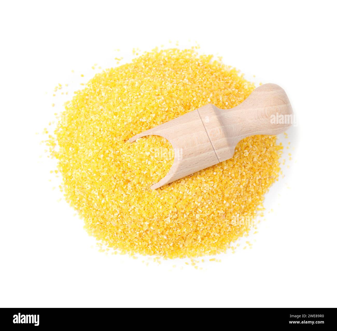 Pile of raw cornmeal and scoop isolated on white, top view Stock Photo ...