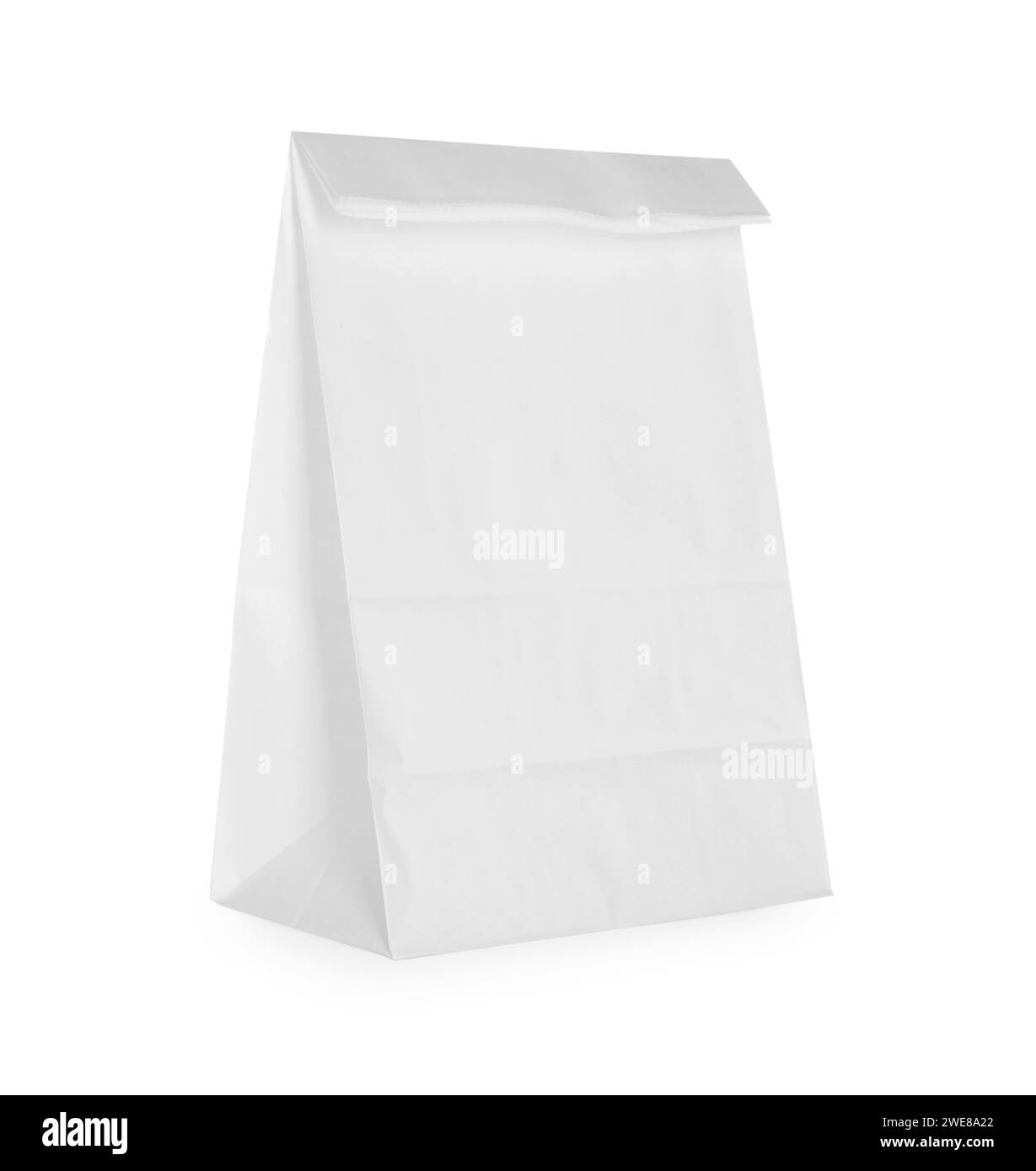 One closed paper bag isolated on white Stock Photo - Alamy