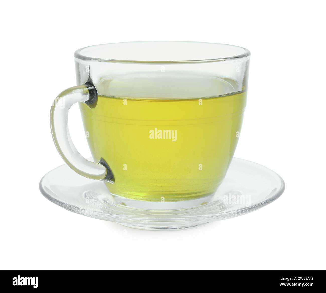 Fresh green tea in glass cup and saucer isolated on white Stock Photo ...