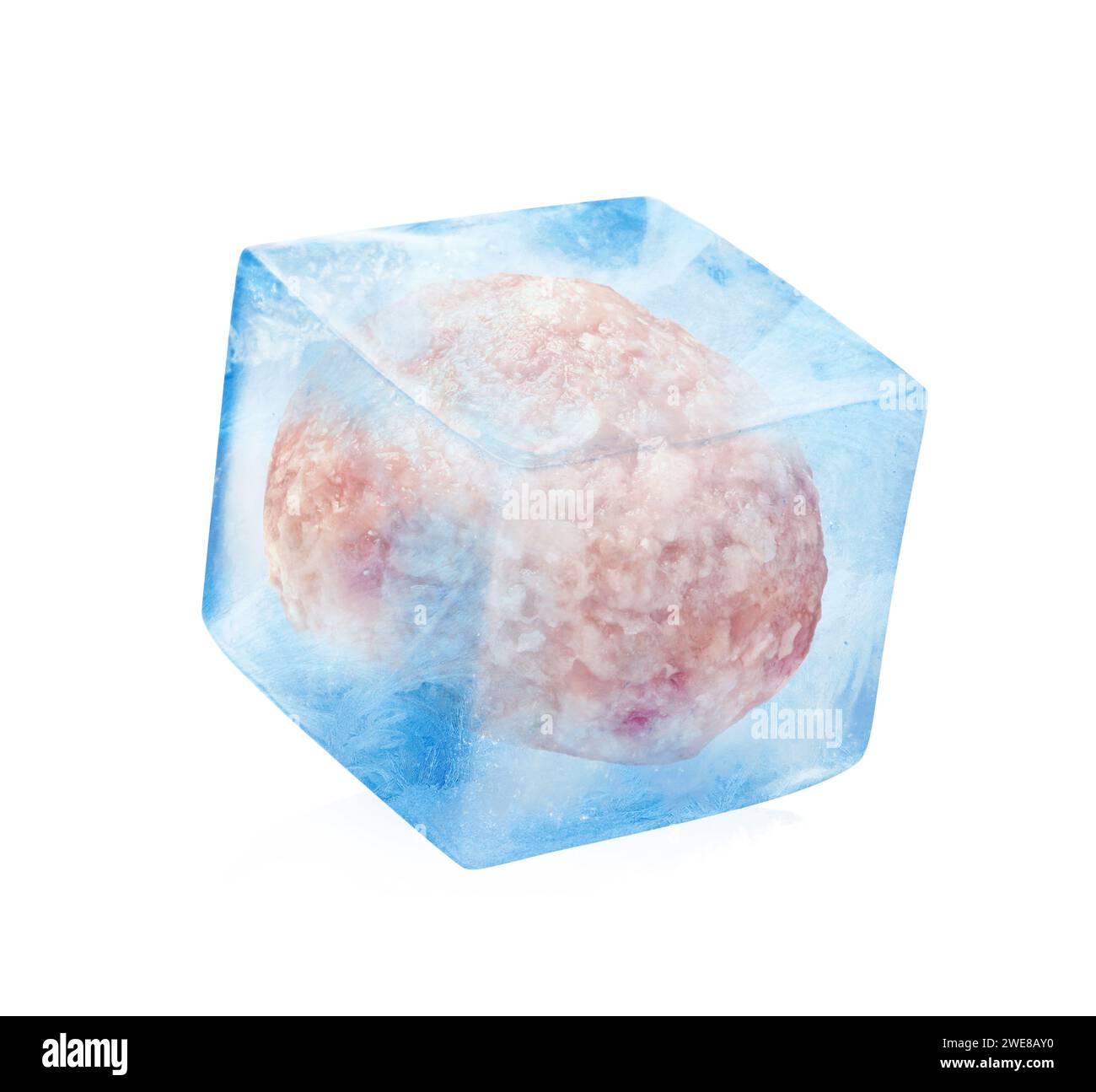 Frozen food. Raw meatball in ice cube isolated on white Stock Photo - Alamy
