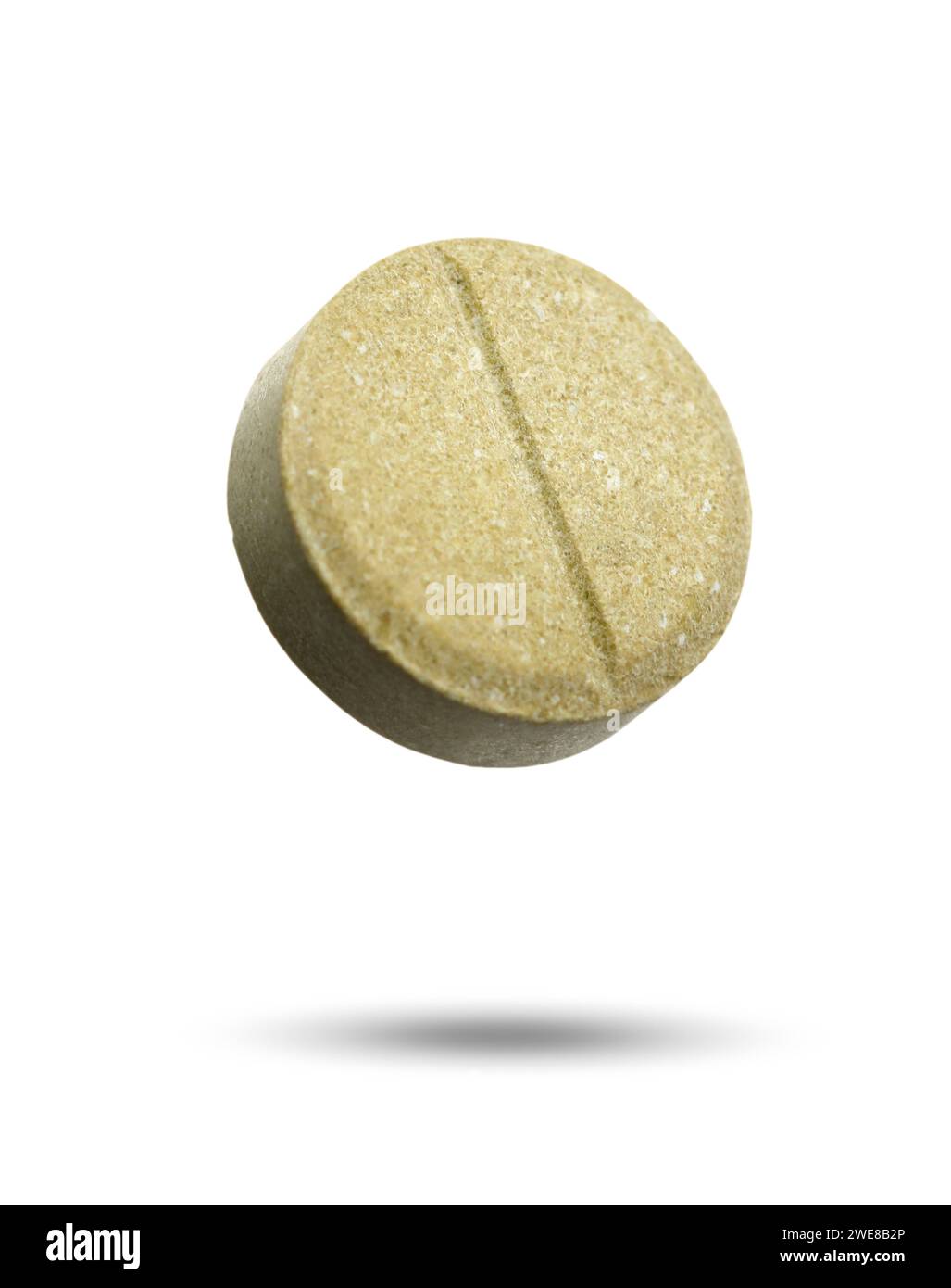 Colorful vitamin pill in air on white background Stock Photo - Alamy