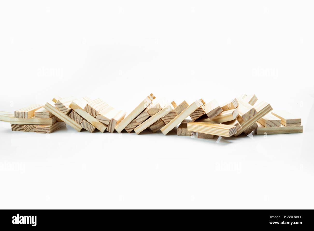 Closeup view of the tower of the wooden block falling on a white ...