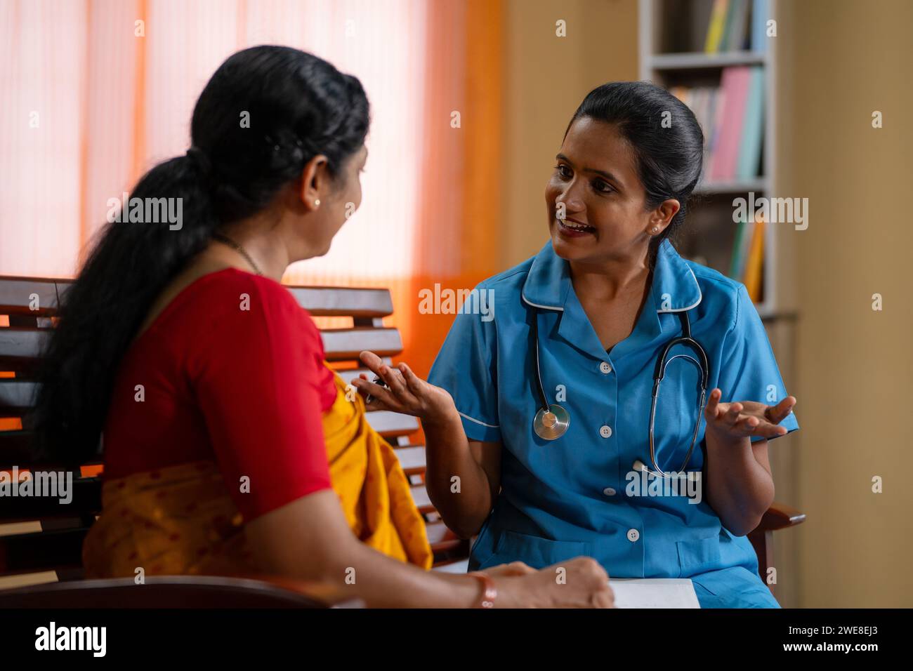 Happy recovered patient with caregiver at home after successful medical ...