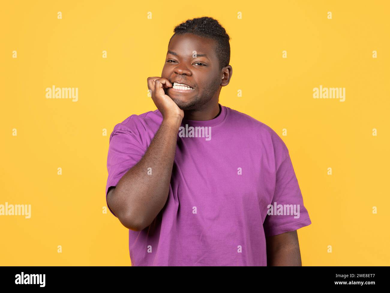 Anxious young man expressing fear hi-res stock photography and images ...