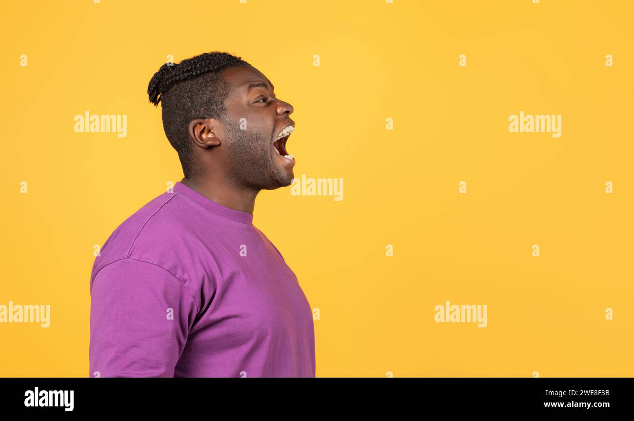 Side view of mad african american guy shouting looking aside Stock ...
