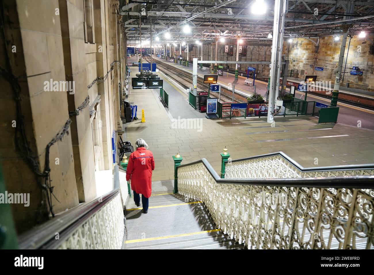 Empty platforms at Edinburgh Waverley train station as rail services to ...