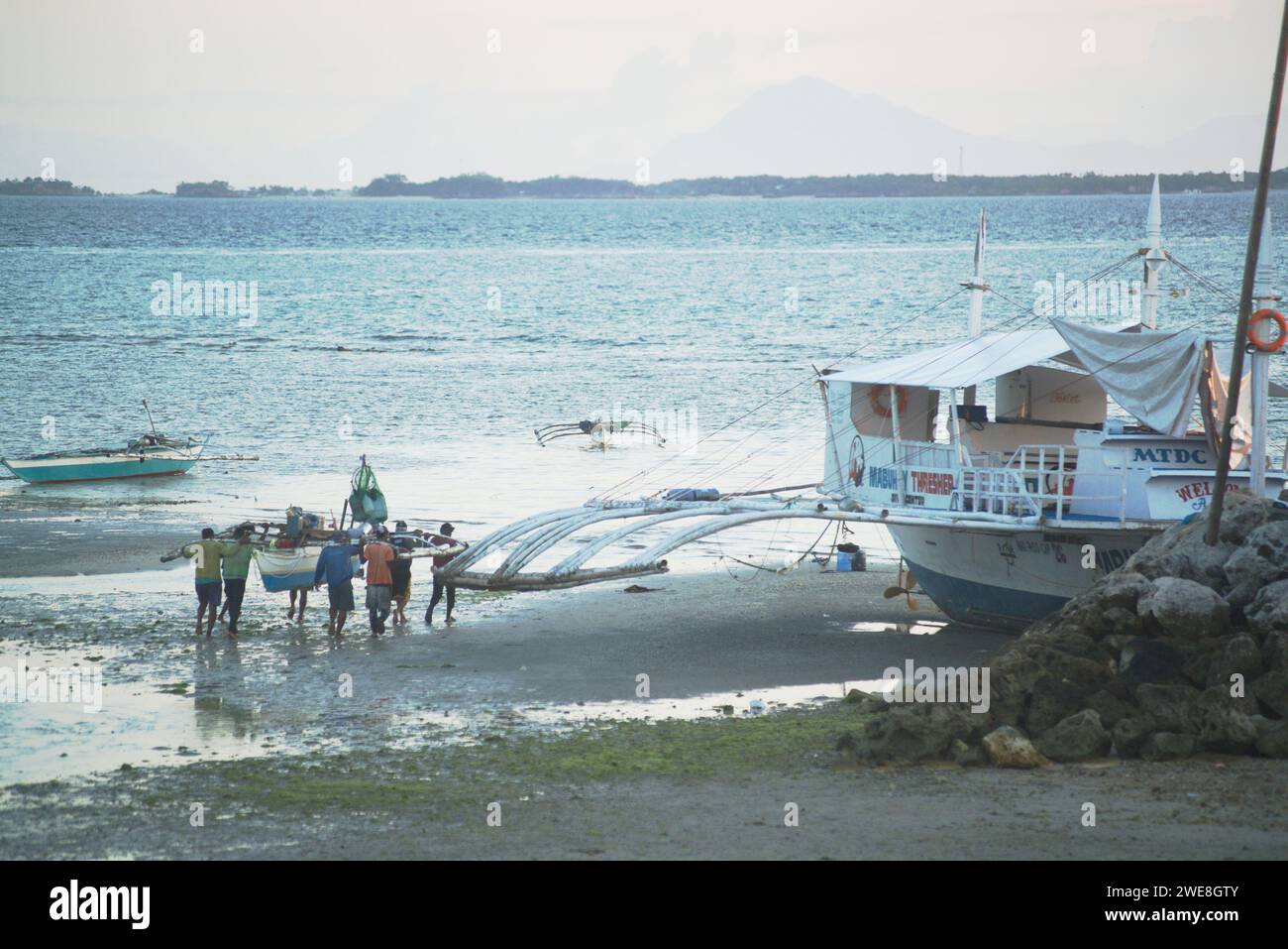 Cebu , Philippines - January 29,2020 : Unidentified villagers helped ...