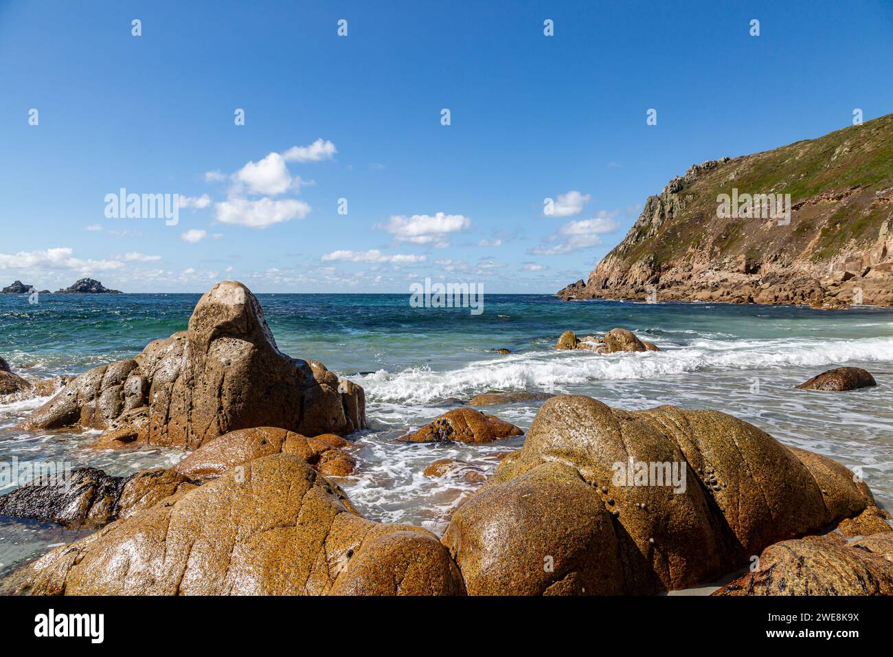 Rock formations on Porth Nanven beach on the Cornwall coast, with a ...