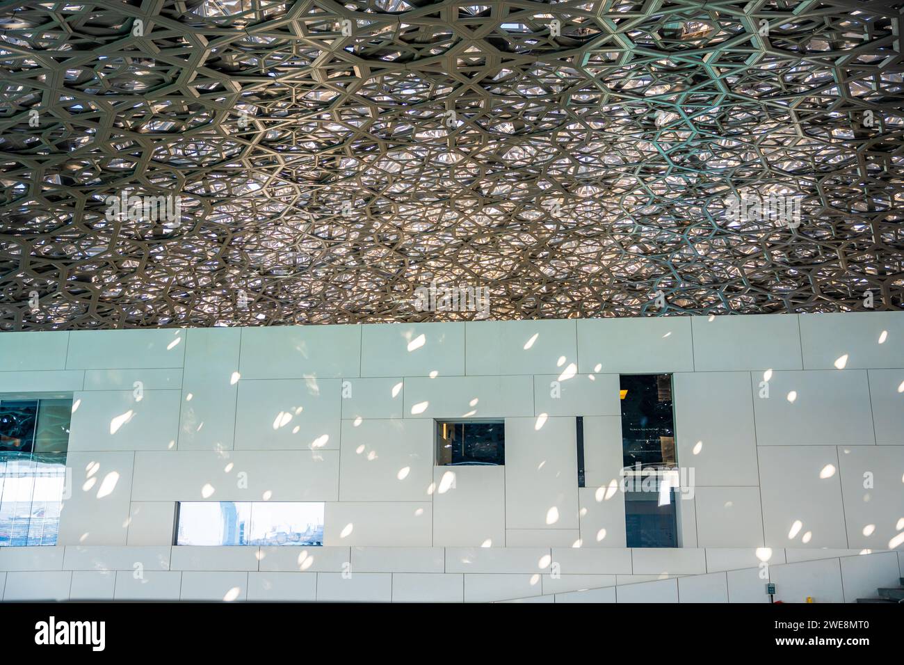 Abu Dhabi, UAE - December 6, 2023: Interior of Louvre, Dome in the form ...