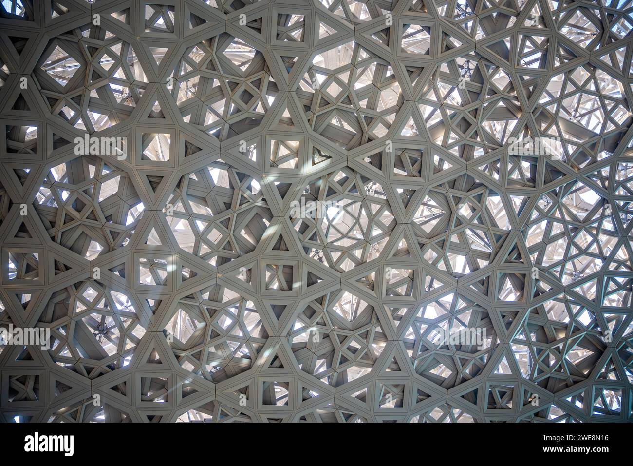 Abu Dhabi, UAE - December 6, 2023: Interior of Louvre, Dome in the form ...