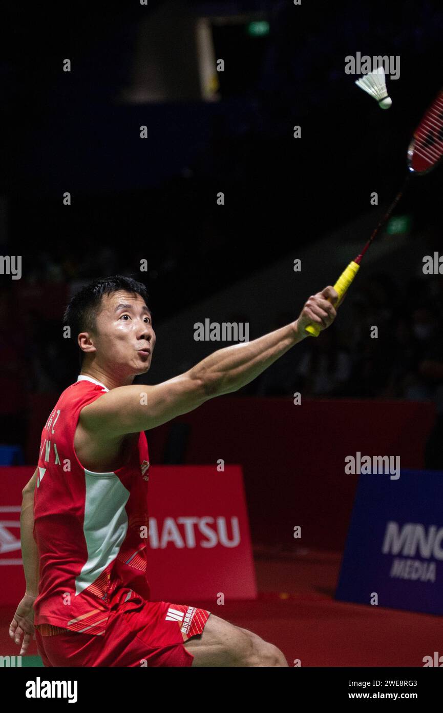 Jakarta, Indonesia. 24th Jan, 2024. Lu Guangzu hits a return during the men's singles first ...
