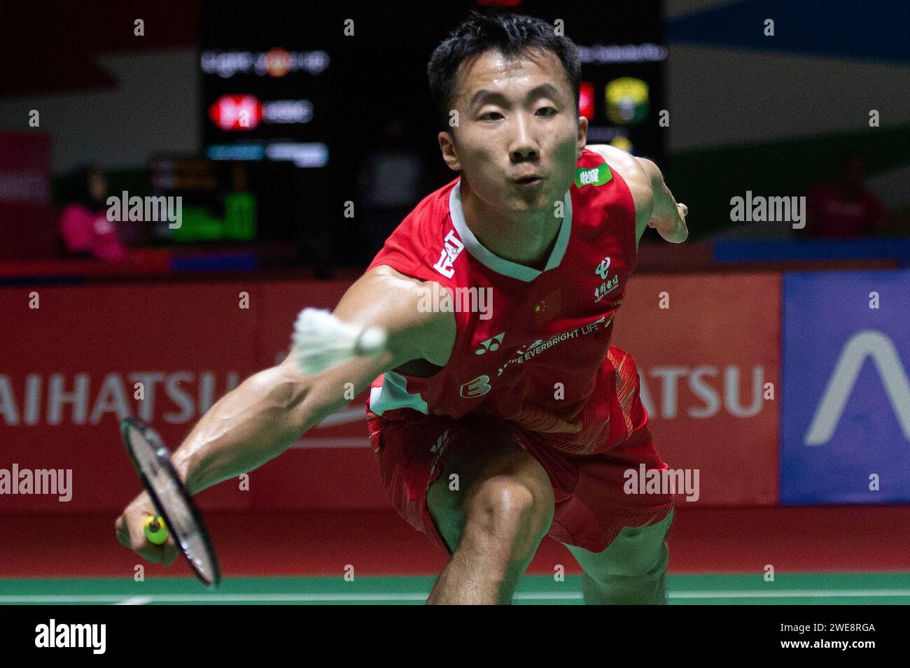 Jakarta, Indonesia. 24th Jan, 2024. Lu Guangzu hits a return during the men's singles first ...