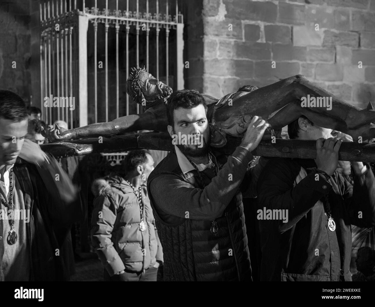 Stations of the Cross carrying an image of Jesus on the cross through ...