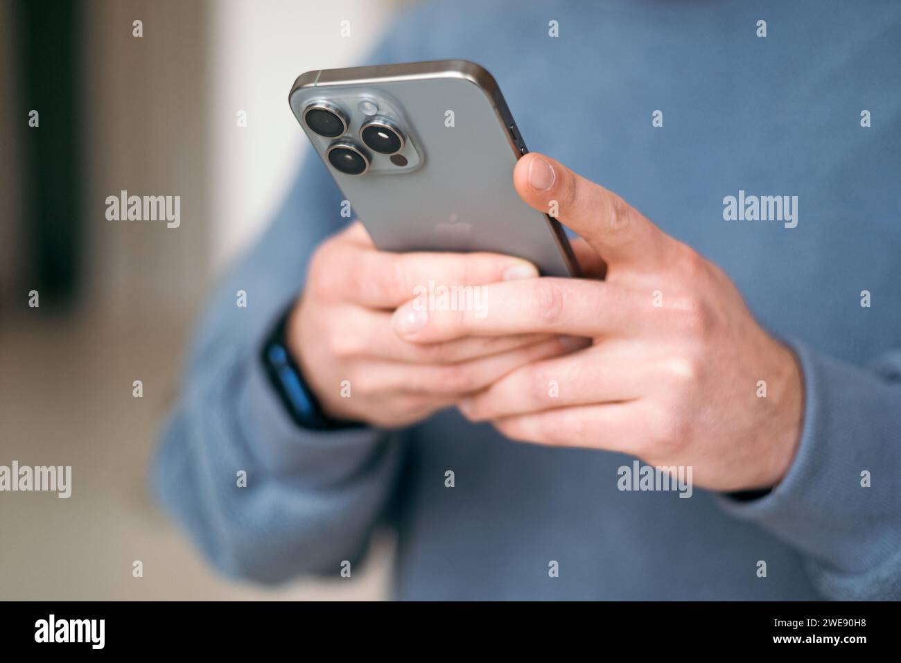 holding cellphone in hands. texting message, scrolling Stock Photo - Alamy