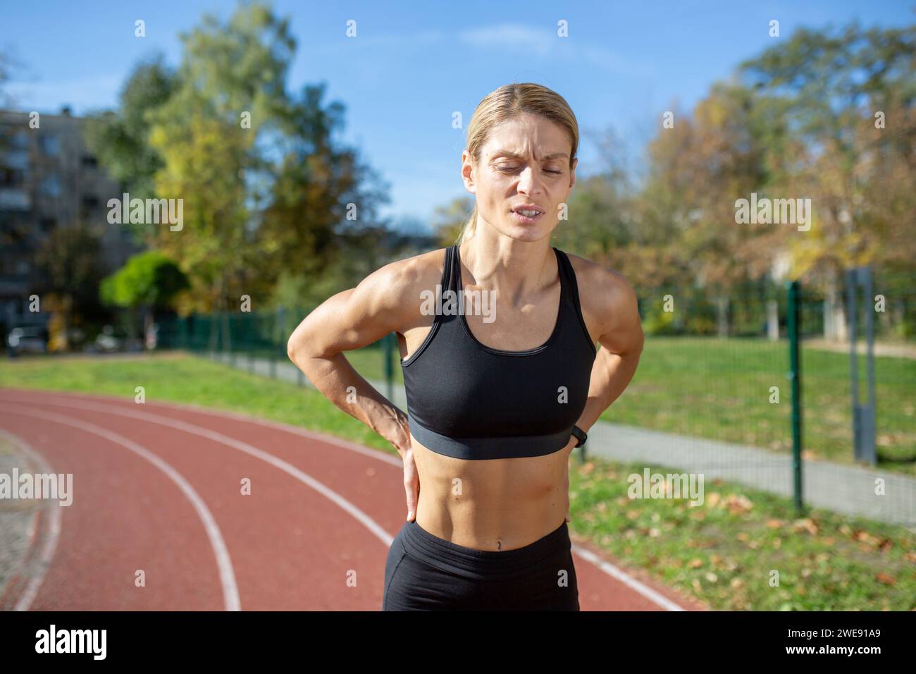 Focused female track and field athlete hi-res stock photography and ...