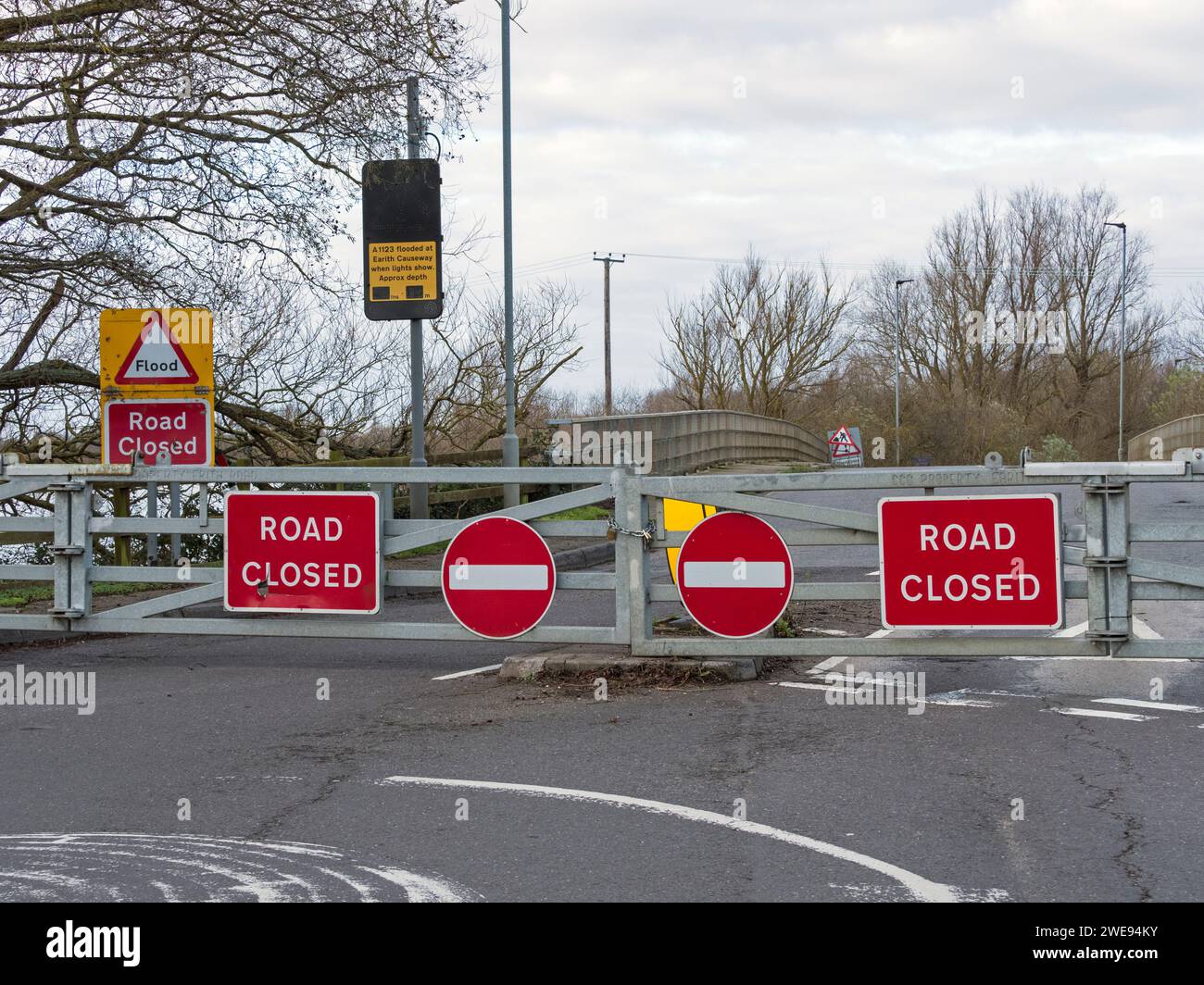 Road closed signs at Earith Bridge due to flooded road, Earith ...