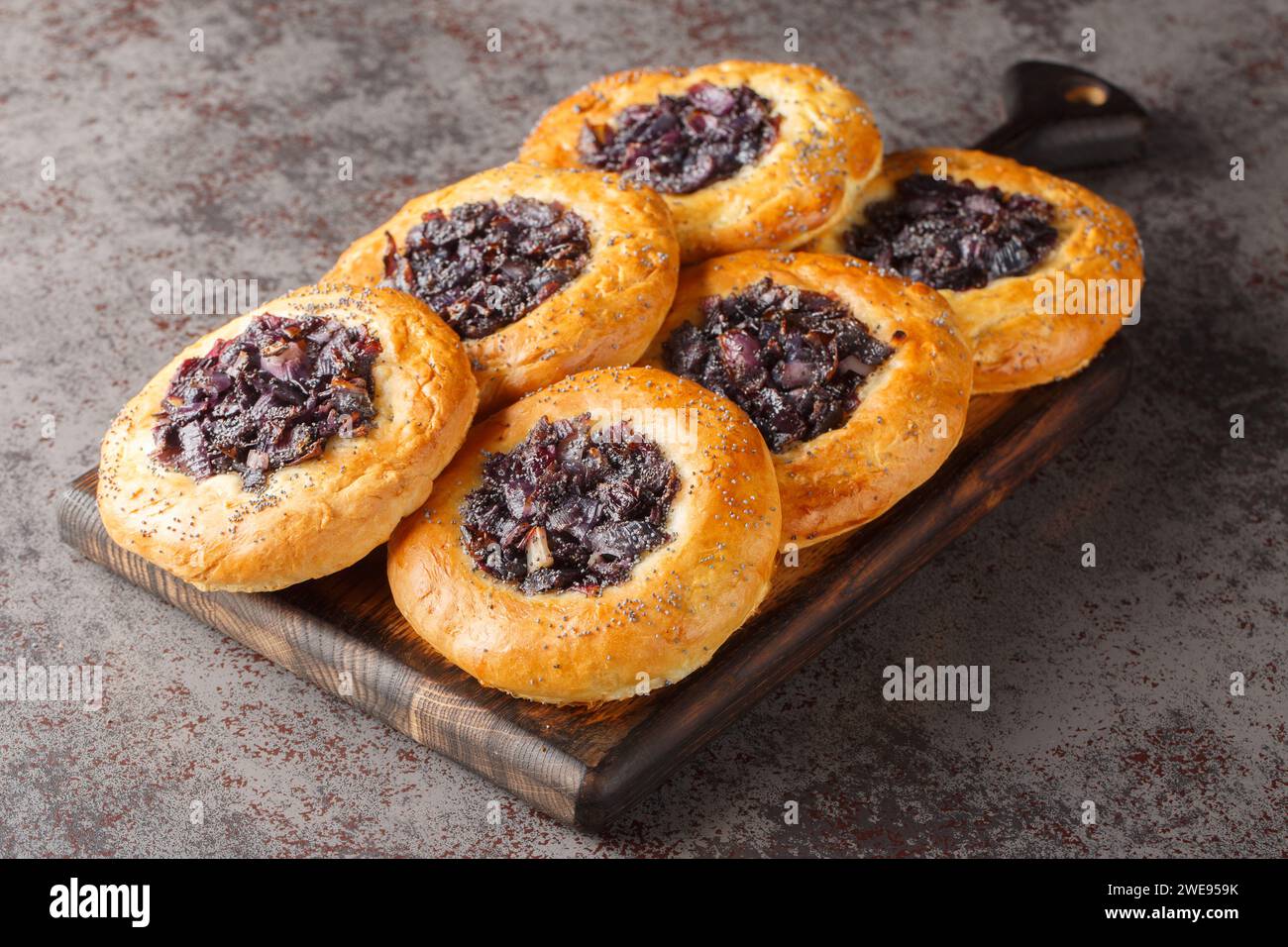 Cebularz lubelski is a round-shaped flatbread topped with diced red ...
