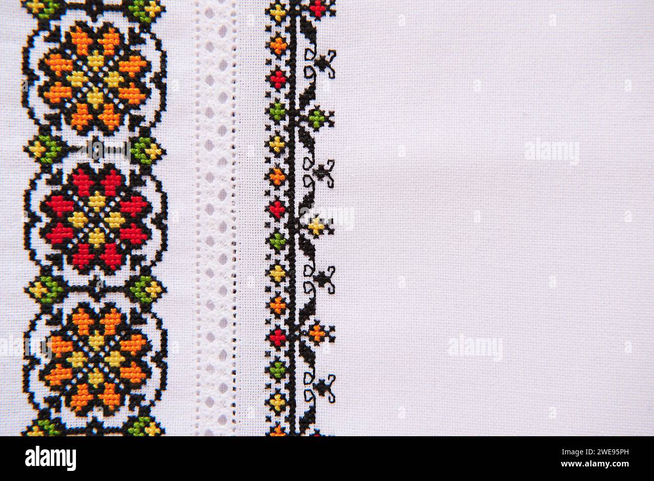 Texture of linen white fabric with embroidered element. Ukrainian ...