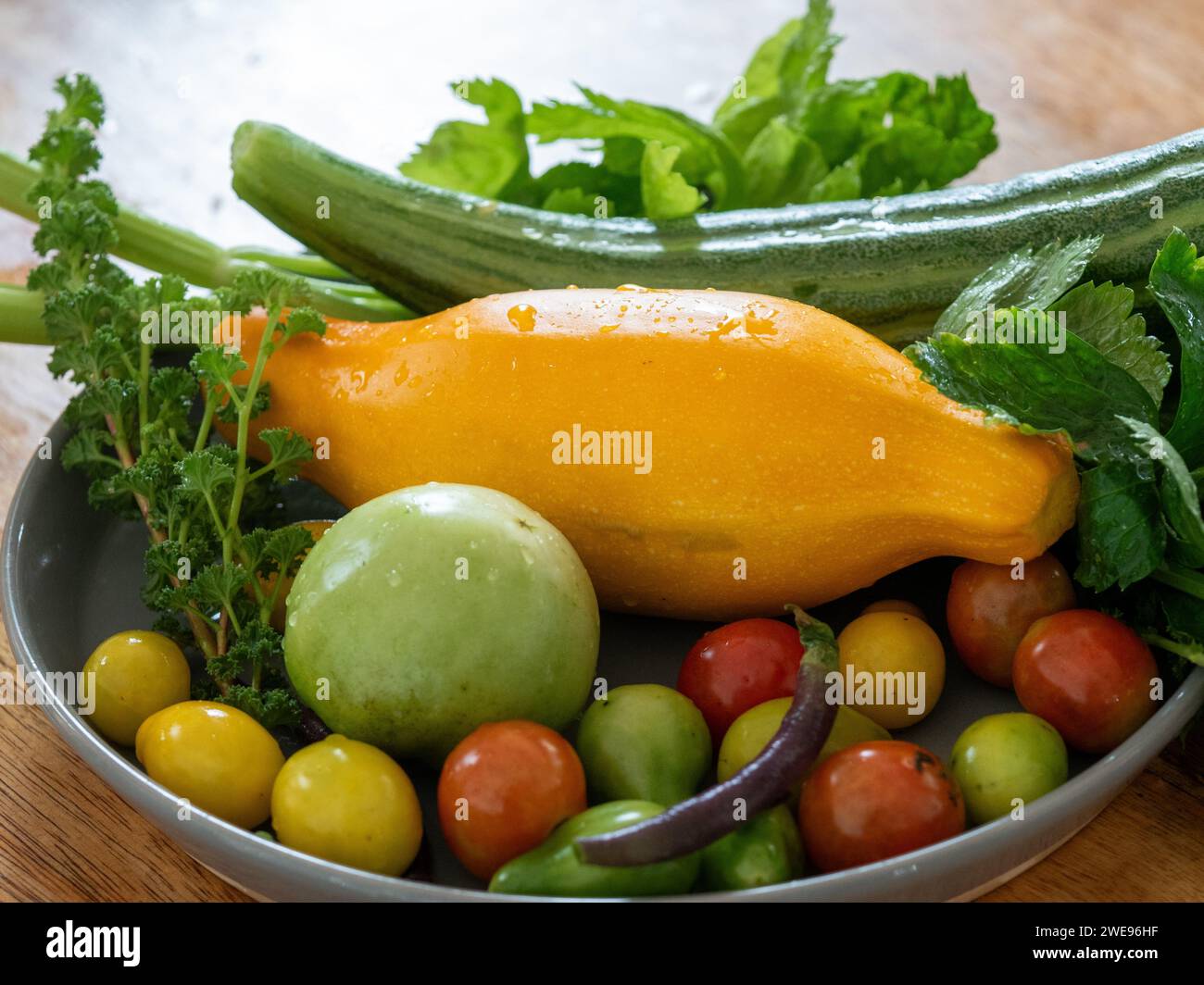 Produce, a bowl of colourful vegetables harvested from the garden ...