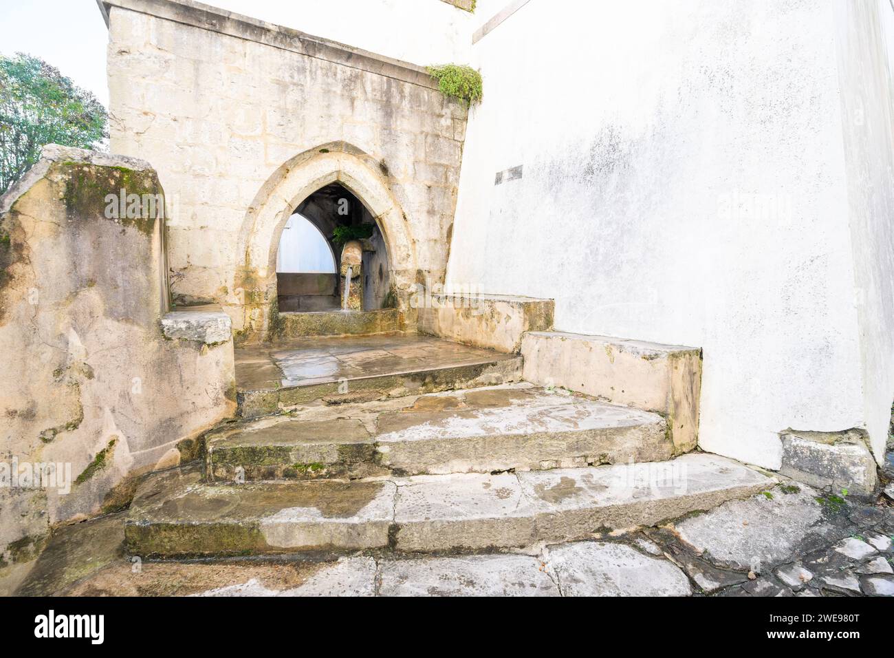 Gothic drinking water fountain near the gates of the village of Ourém ...