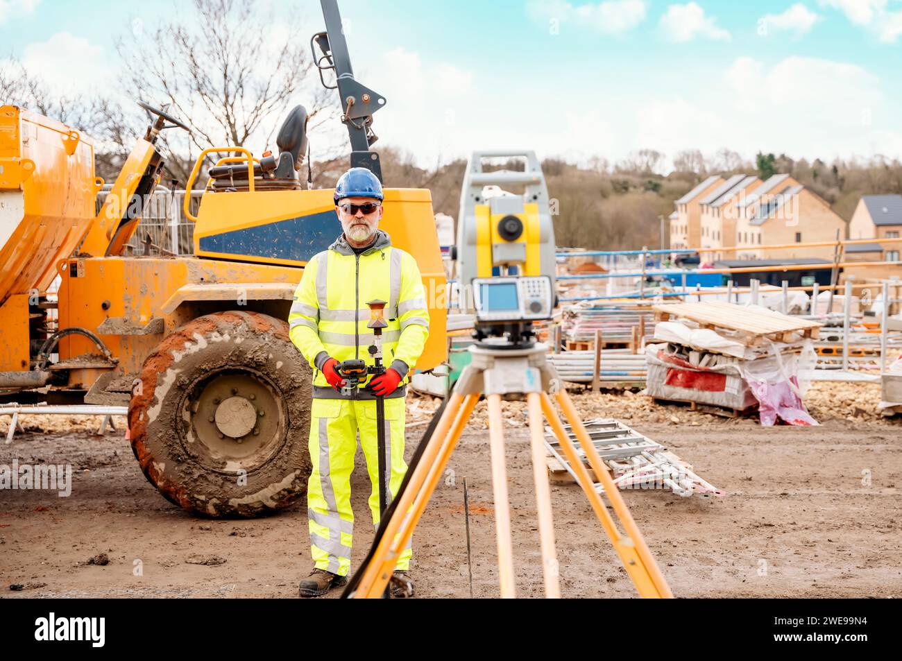 Surveyor builder site engineer with theodolite total station at ...